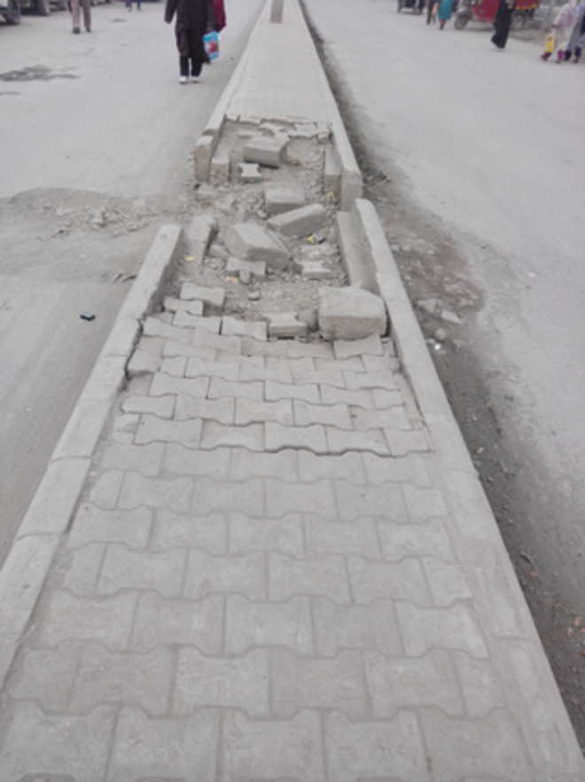 4 months after floods, footpath work still incomplete in city - The Tribune