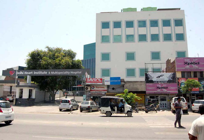 Building bylaws flouted? Hospital says no - The Tribune