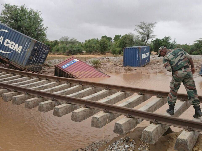 Army men restore damaged rail line - The Tribune