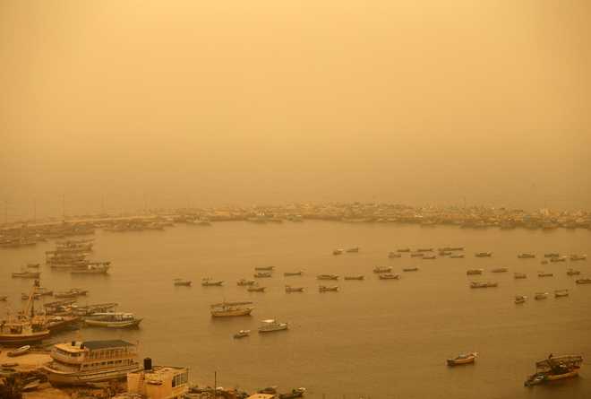 Deadly storm engulfs Middle East, slows Syria air strikes - The Tribune