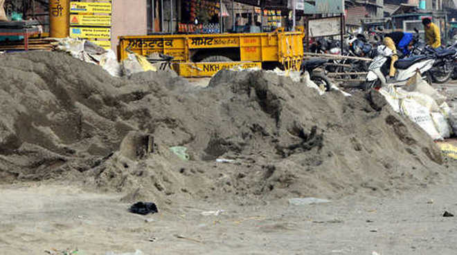 Construction material on roads a traffic hazard : The Tribune India