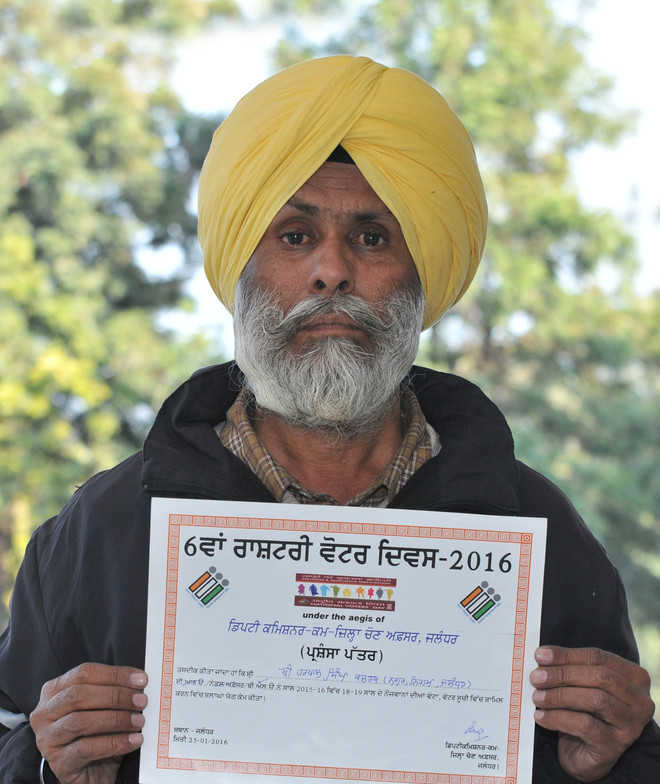 Booth Level Officer honoured - The Tribune