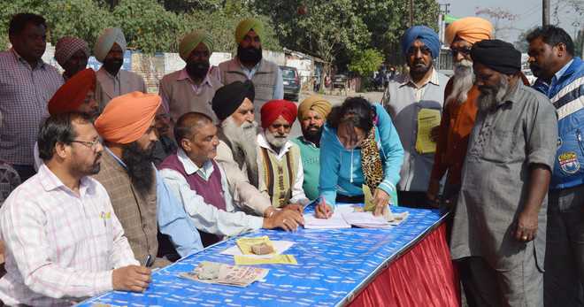 NGO holds signature campaign on voting - The Tribune