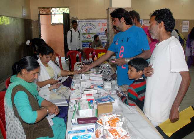 1,000 examined at health camp : The Tribune India