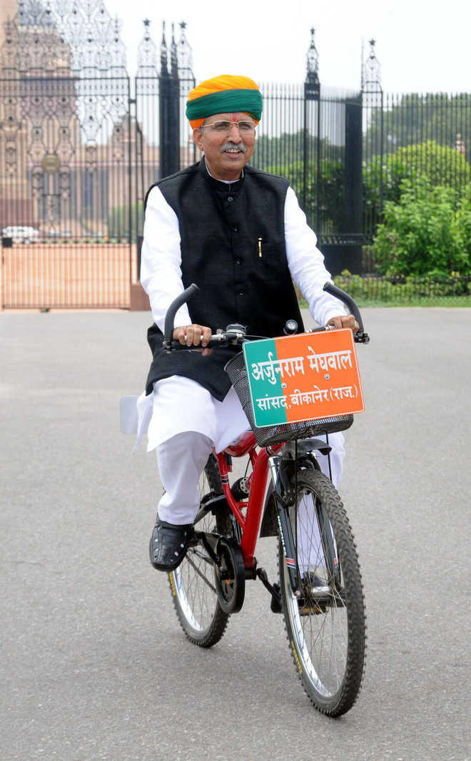 R’sthan MP Meghwal cycles for oath-taking - The Tribune