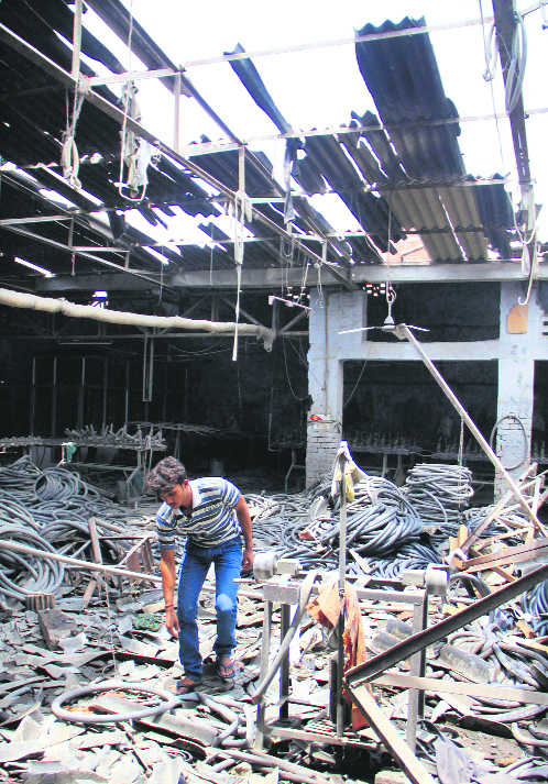 Three hurt as compressor explodes in rubber factory : The Tribune India