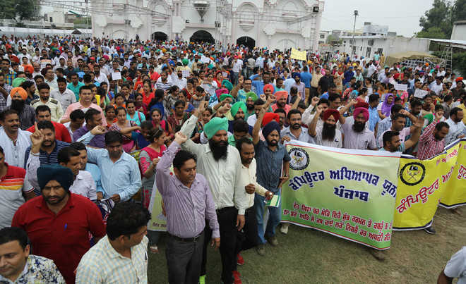 Computer teachers seek regularisation of services, take out protest ...