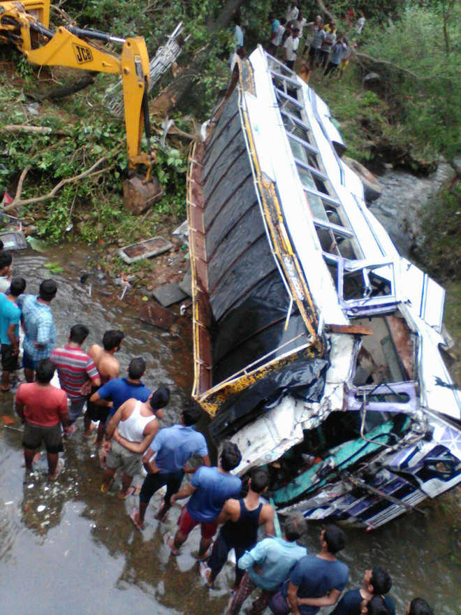 Student killed, 12 hurt as school bus falls off bridge - The Tribune
