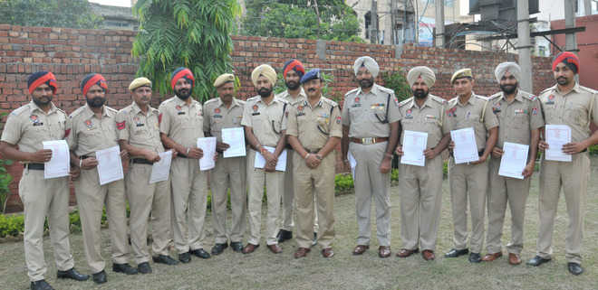 VAHAN scheme: 11 policemen honoured for recovery of vehicles - The Tribune