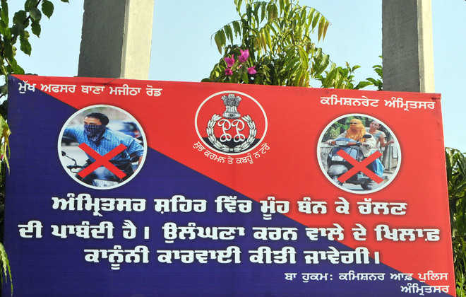 Traffic police use hoardings to publicise ban on covering face - The ...