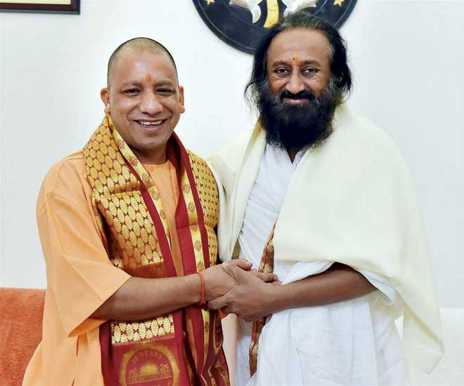 Ravi Shankar meets Adityanath, says no formula yet on Ayodhya : The ...