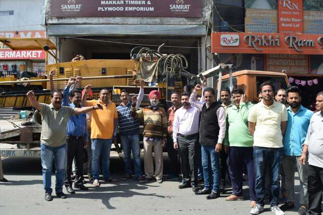 Residents stop digging work on newly constructed road - The Tribune