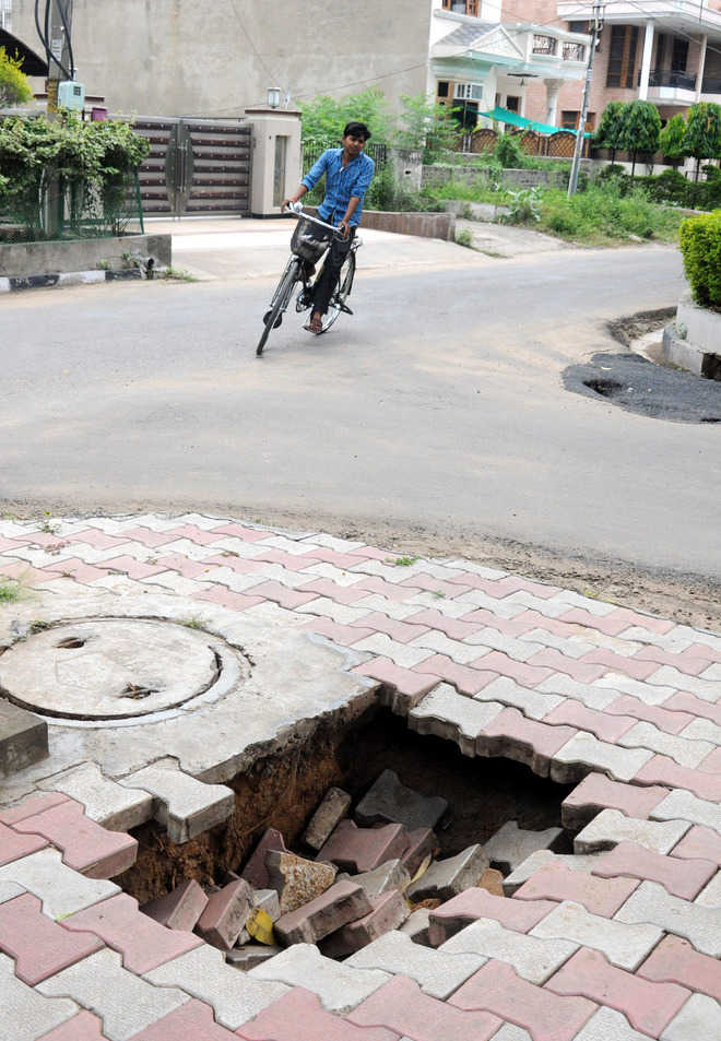 Road cave-in! Who cares? : The Tribune India