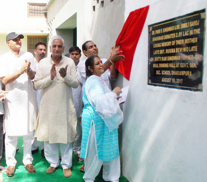 NRI couple gifts hall to students : The Tribune India