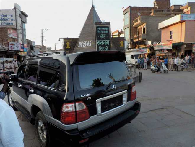 Luxury car, old notes seized from Dera Sacha Sauda HQ; rooms sealed ...