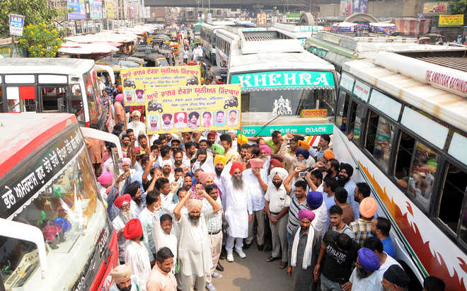 Protest over illegal buses, people harried - The Tribune