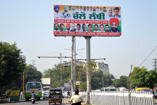 Cong rally banners irk commuters - The Tribune