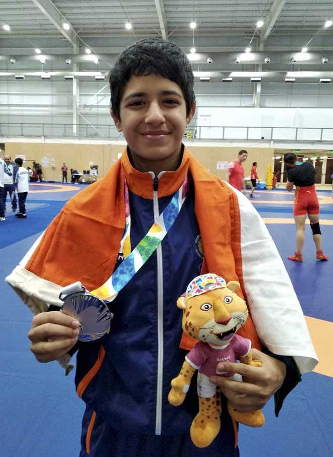Simran wrestles silver, hockey boys lose in final - The Tribune
