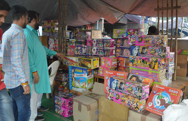 Dipping sales, no space for shops worry cracker dealers - The Tribune