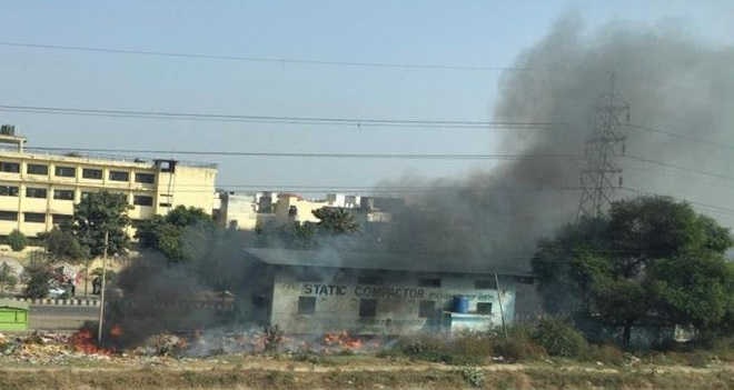 Burning of garbage near static waste compactor raises many an eyebrow ...