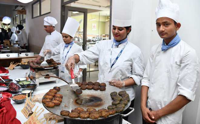 Students show culinary skills at PCTE int’l tourism event - The Tribune