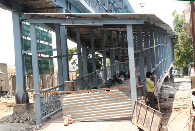 Work on FOB escalators still pending - The Tribune