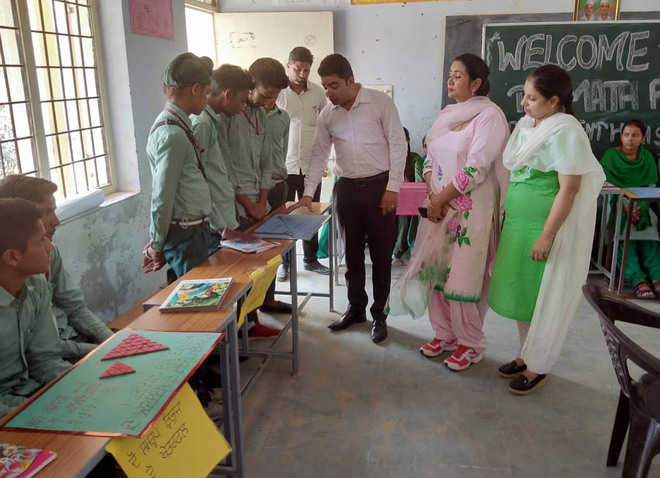 School students try various equations at Math Fair - The Tribune