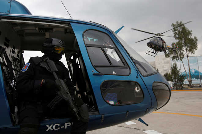Police choppers thump over Mexico City as drug crime rises - The Tribune