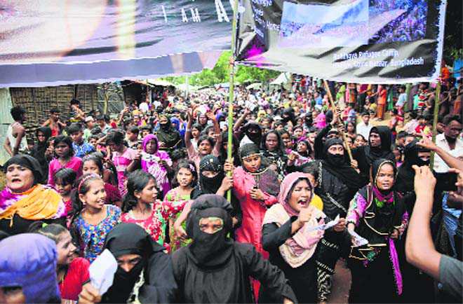 A year on, Rohingya protest for justice - The Tribune