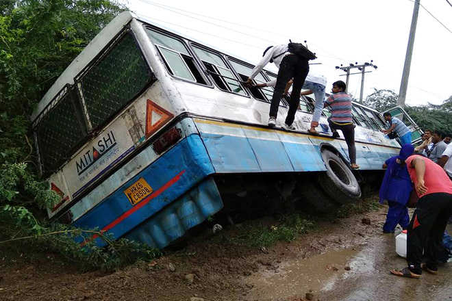 Bus skids off, narrow escape for 35 : The Tribune India