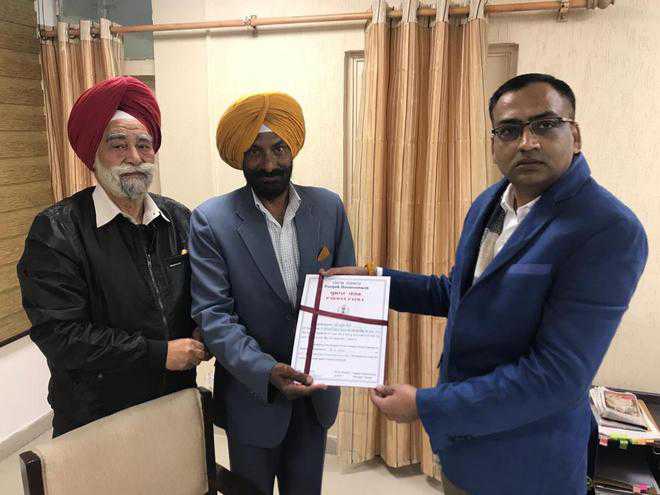 Year later, man declared race winner - The Tribune