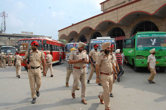 Panic grips bus stand as armed transporters clash : The Tribune India