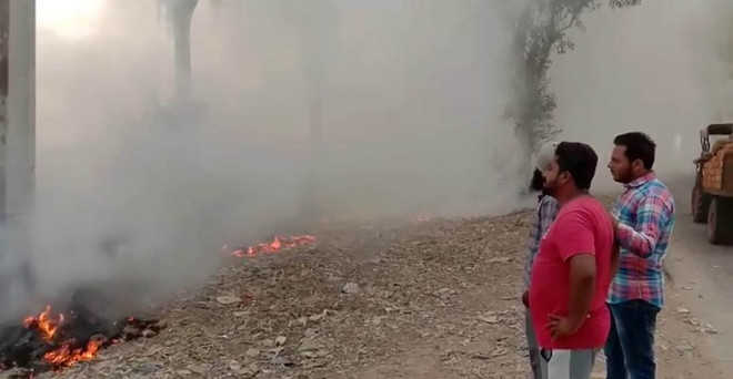 Four days on, plastic garbage dump fire yet to be doused - The Tribune