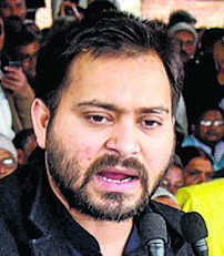 Tejashwi fined Rs 50,000, asked to vacate house - The Tribune