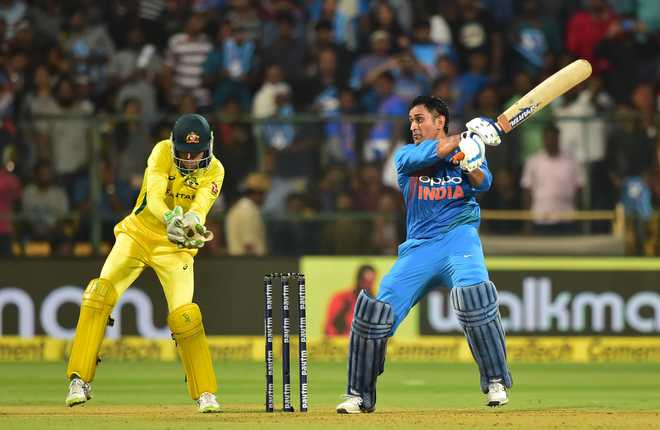 Dhoni gets hit on forearm during net session - The Tribune