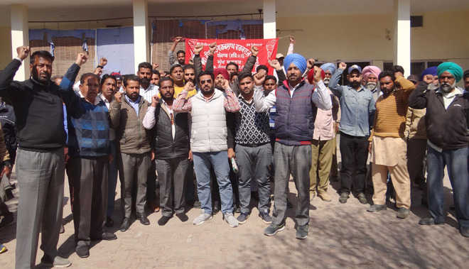 PWD workers stage protest over demands - The Tribune
