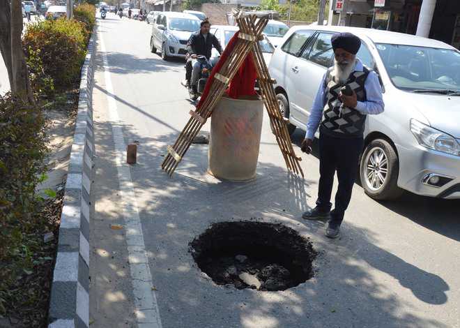 Pakhowal Road caves in again, authorities blame old manholes - The Tribune
