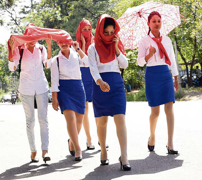 Heat showing up, avoid going out, says Met - The Tribune